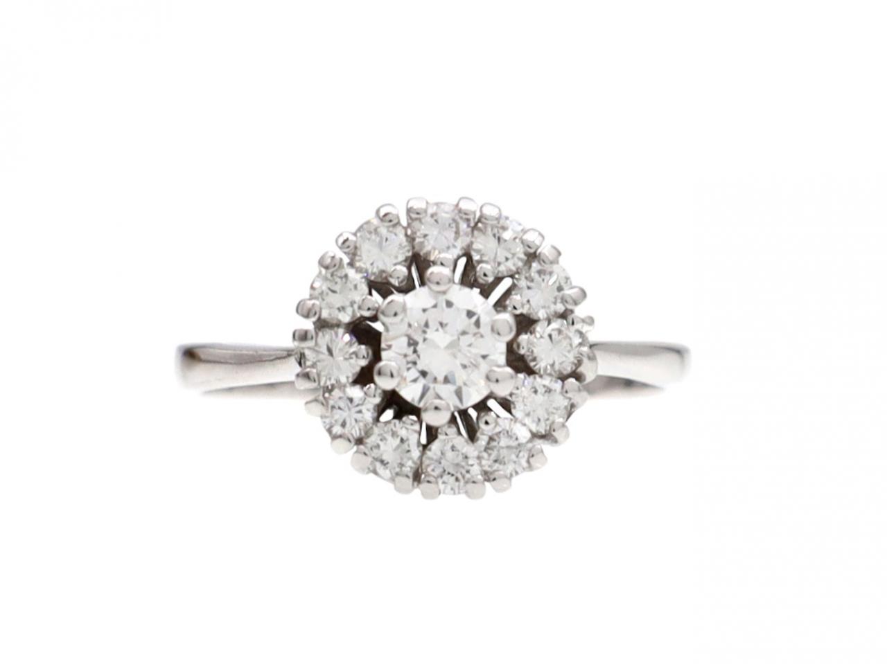 Contemporary diamond circular cluster engagement ring