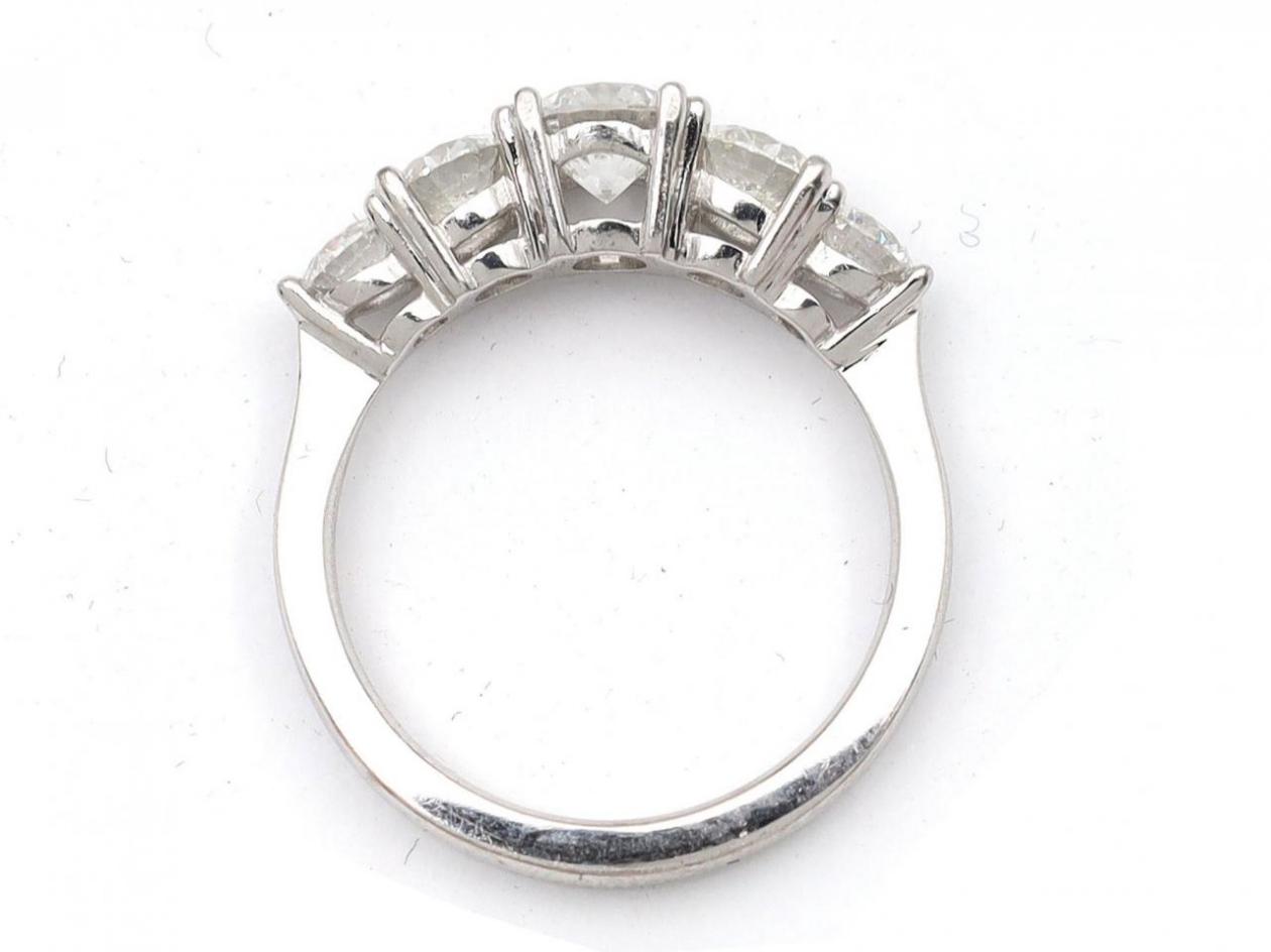 Contemporary graduating five stone diamond ring